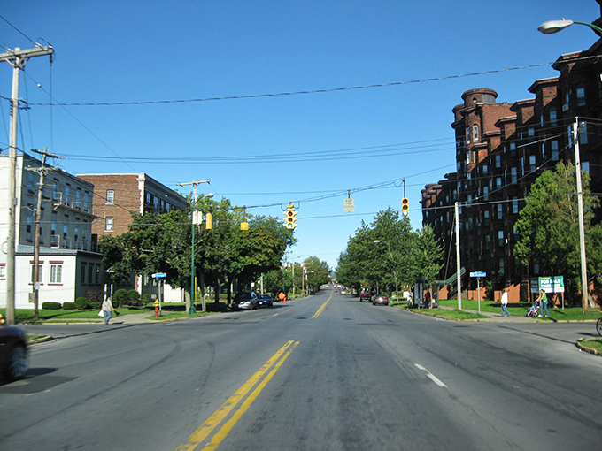 Utica's farmers market brings the community together under historic industrial architecture, where local produce meets global flavors in a vibrant weekend ritual.