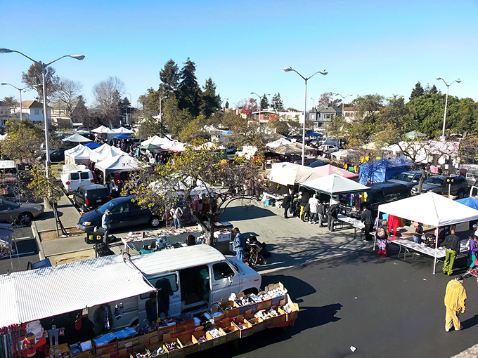 A bird's-eye view of treasure hunting paradise! White tents dot the Ashby BART parking lot like a village of possibility where one person's castoffs become another's treasures.