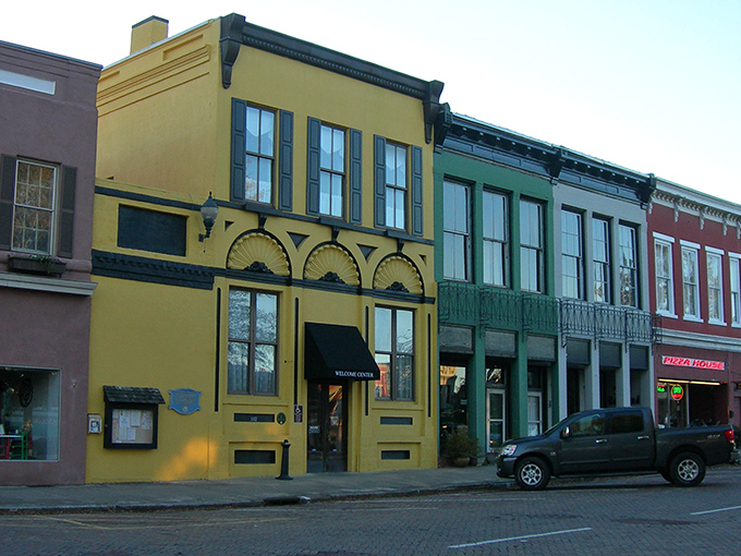 Abbeville's historic downtown buildings pop with color like a Southern-fried Wes Anderson film set. No Instagram filter needed here—this is pure small-town charm. 