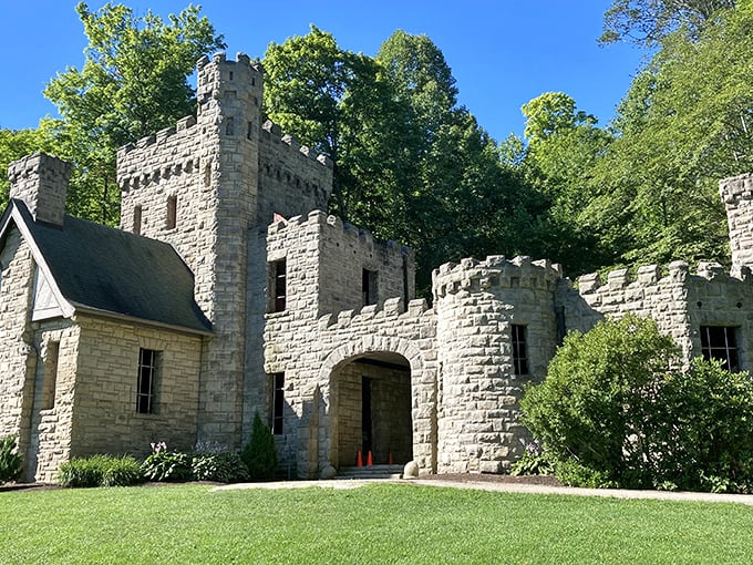 A medieval fantasy come to life—Squire's Castle stands proudly against a brilliant blue Ohio sky, its stone turrets and battlements defying Midwestern expectations.