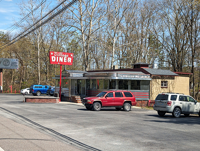 That iconic red sign against the blue Pennsylvania sky isn't just a diner marker – it's a beacon of hope for the breakfast-desperate traveler.