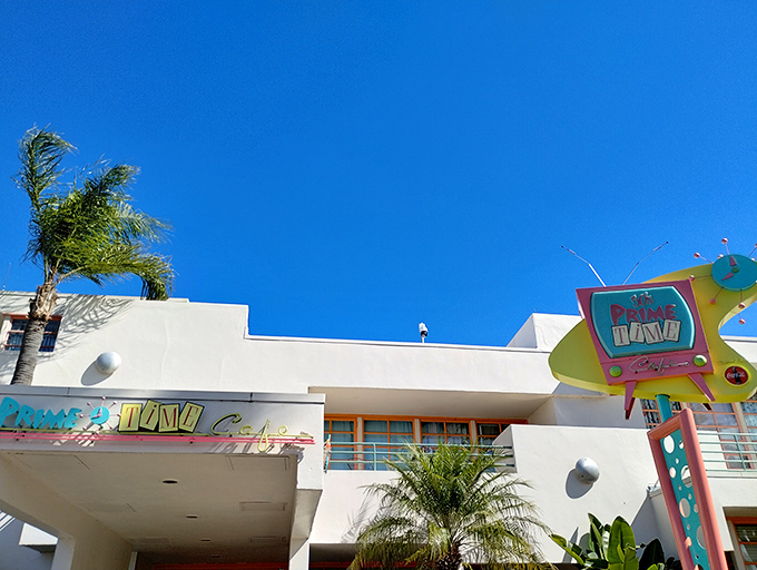 The retro neon sign beckons like a time portal to the 1950s, promising comfort food and a healthy serving of nostalgia.