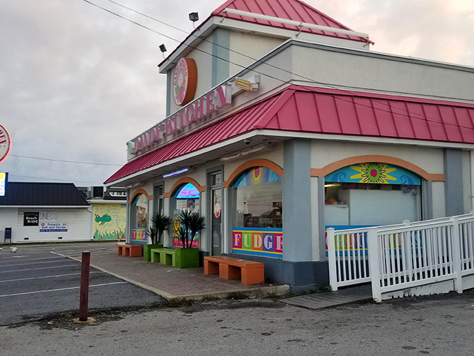 The pink-roofed beacon of sweetness beckons from Coastal Highway, promising a sugar rush that transcends generations.
