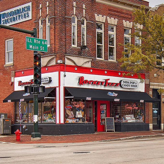 The red and white storefront of Rocket Fizz stands like a beacon of sweetness on St. Charles' brick-lined streets, promising sugary salvation to the glucose-deprived.