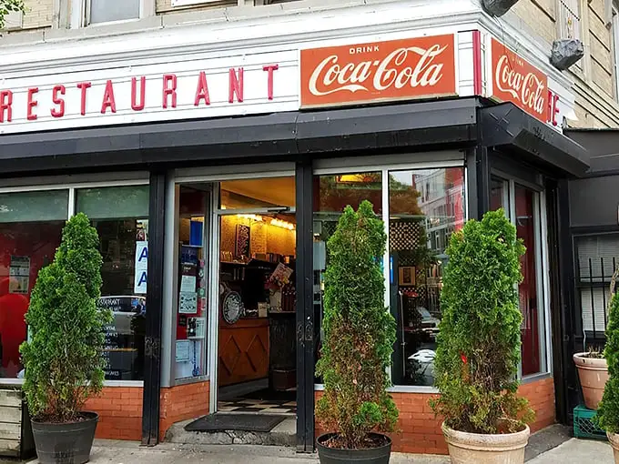 That classic corner storefront isn't just architectural eye candy—it's a beacon of breakfast hope on Washington Avenue, promising pancake nirvana inside.