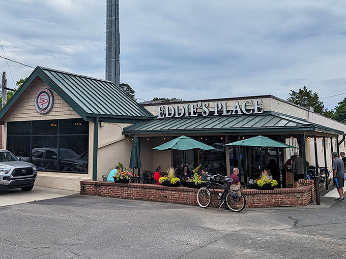 Eddie's Place welcomes hungry souls with its distinctive green roof and inviting patio – where breakfast dreams come true and friendships are forged over coffee.