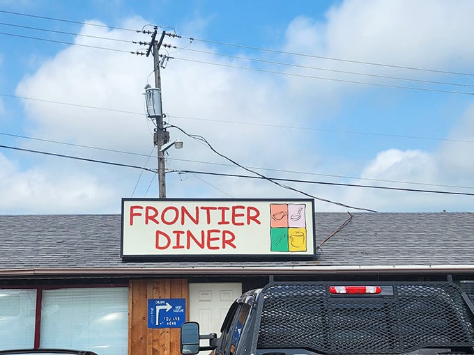 No architectural awards needed here—just a humble wooden exterior that promises more flavor per square foot than any fancy establishment in town.