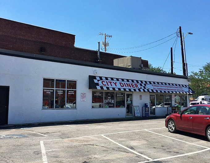 The classic black-and-white checkered awning isn't trying to be retro—it just is. City Diner stands as a beacon of breakfast hope in Kansas City.
