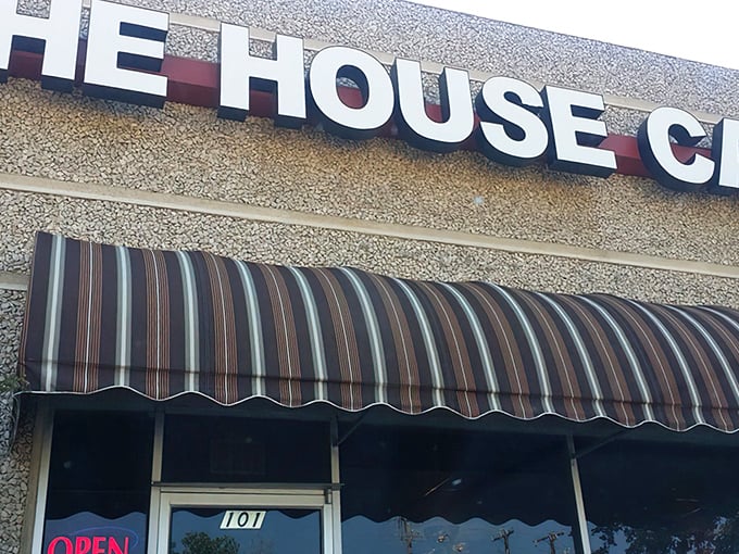 The unassuming exterior of The House Cafe stands as a testament to the old adage: never judge a breakfast by its building.
