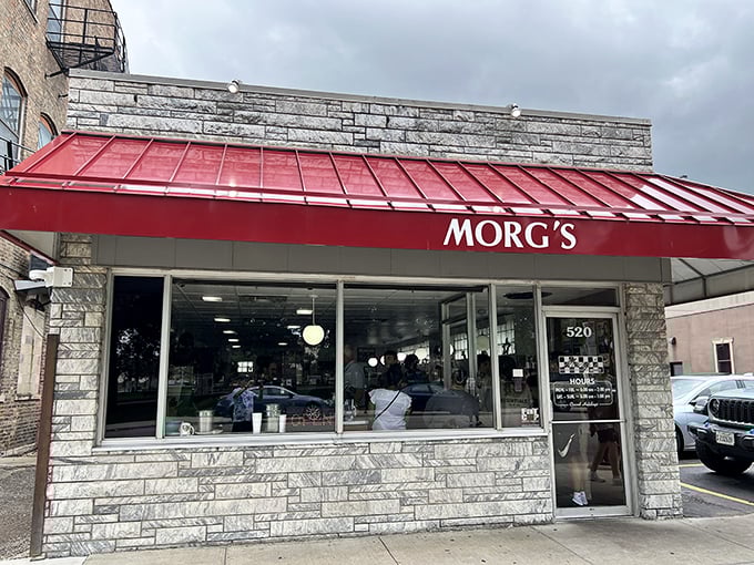 Morg's iconic white building with its bold red script sign stands as a beacon of breakfast hope on Mulberry Street in Waterloo.