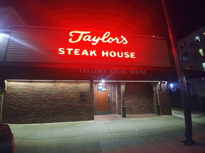 That iconic red neon glow isn't just a sign—it's a beacon for meat lovers across Los Angeles, promising old-school steakhouse perfection within those brick walls.