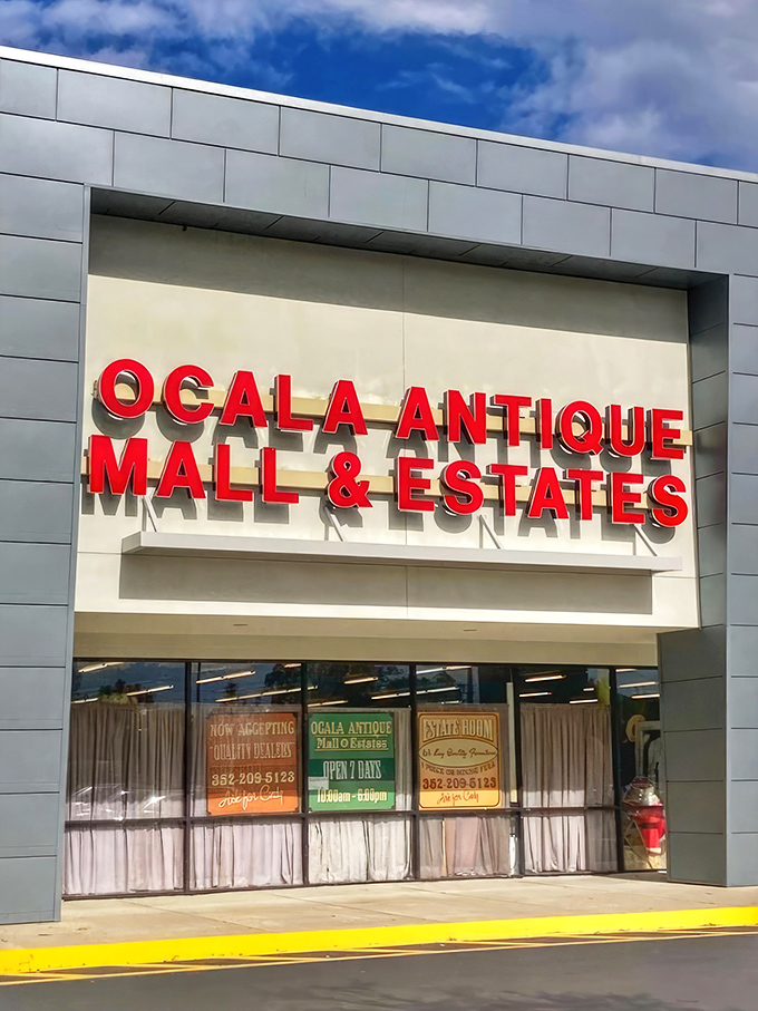 The modern facade of Ocala Antique Mall belies the time-traveling adventure waiting inside. Red signage beckons treasure hunters from across Florida.