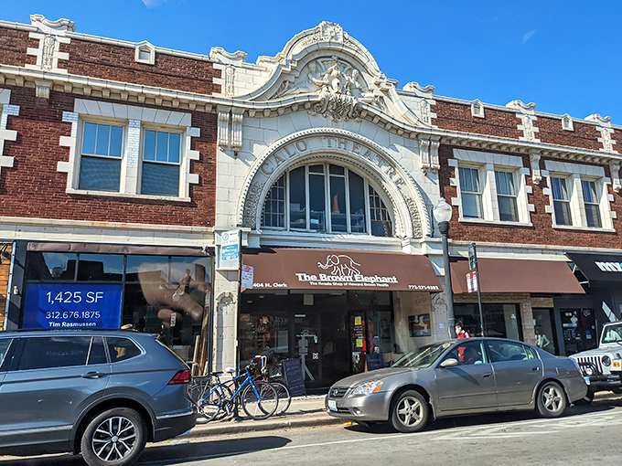 The grand entrance beckons like a theatrical invitation. This historic façade on Clark Street promises treasures within, its ornate white arch a portal to thrifting adventures. 