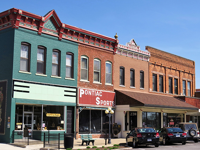 Historic storefronts line Pontiac's downtown, where Pontiac Sports stands as a colorful reminder that small-town retail can still thrive in the Amazon age.