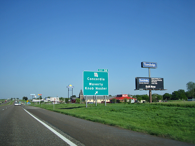 Highway signs point the way to Knob Noster – where your retirement dollars stretch further than your grandmother's homemade taffy at the county fair.