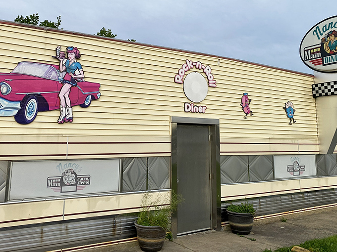 The classic Americana exterior of Nancy's beckons with its roller-skating waitress mural and vintage signage—a time capsule of diner culture waiting to be explored.