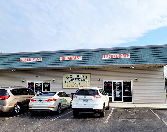 The unassuming exterior of Woodsby's Cafe stands as a testament to the age-old truth: never judge a restaurant by its roof tiles.