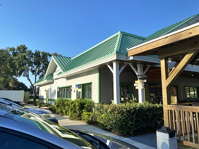 The distinctive green roof isn't just for show—it's nature's way of saying "seafood this way!" Florida architecture that promises coastal comfort inside.
