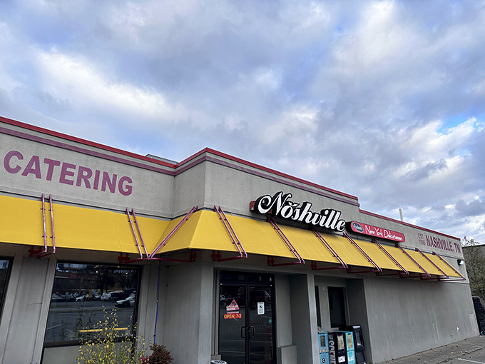 Those bright yellow awnings aren't just eye-catching—they're like a beacon guiding hungry souls to their New York deli salvation in Nashville.