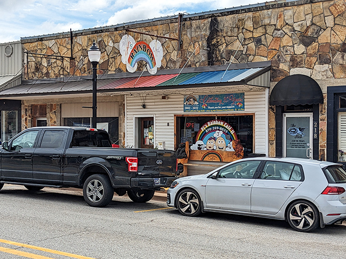 The rainbow sign beckons like a promise – this unassuming stone facade in Mountain View hides culinary treasures worth discovering. 