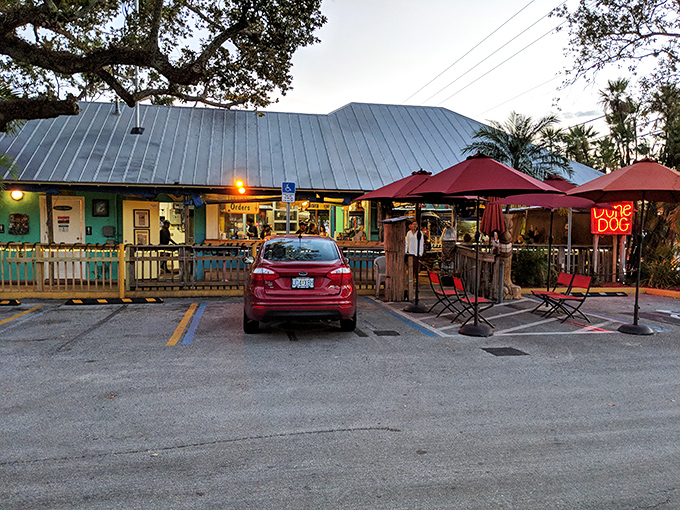 The surfing dog on the sign says it all – this Jupiter gem is where beach vibes and comfort food create the perfect Florida escape.