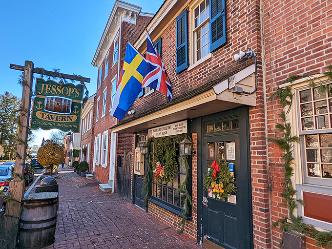 The historic façade of Jessop's Tavern welcomes you with international flags and colonial charm. History never looked so deliciously inviting!