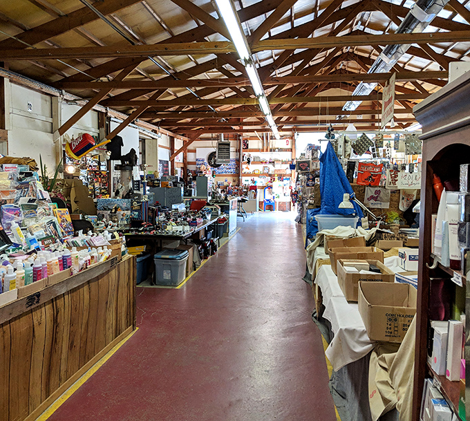 The wooden rafters of Jamie's Flea Market tell stories of decades of treasure hunting, creating a rustic cathedral for bargain seekers.