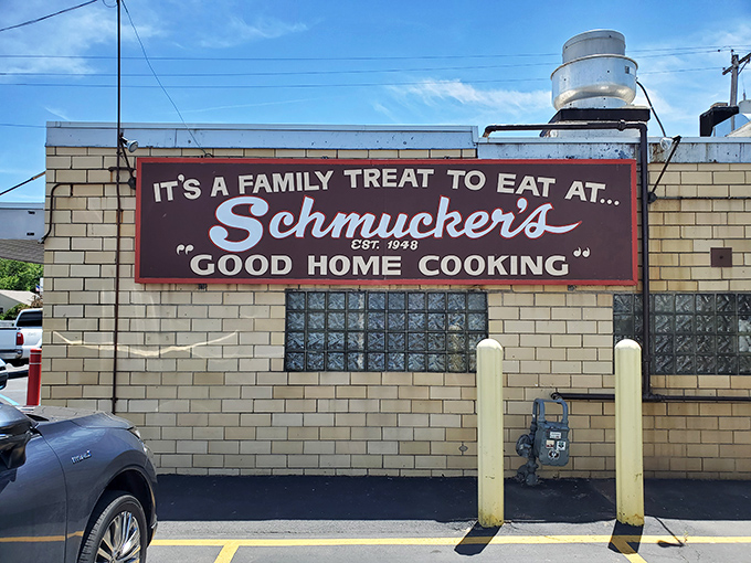 The sign says it all – "It's a Family Treat to Eat at Schmucker's." No flashy neon, no pretension, just a promise of good home cooking that's been kept since 1948.