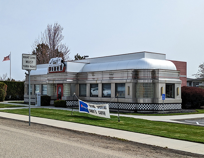 The gleaming silver exterior of Candy's Cafe screams "classic Americana" – this time-traveling diner promises a nostalgic feast before you even step inside.