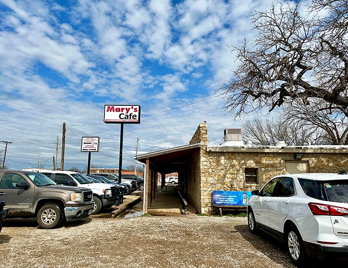 The unassuming exterior of Mary's Cafe stands proudly against the Texas sky – proof that culinary greatness often comes in humble packages.