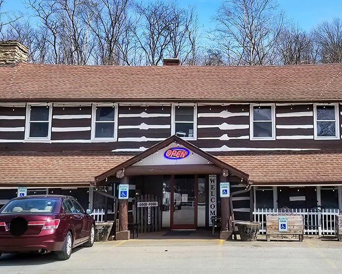 The Log Cabin Inn's exterior is exactly what Kentucky comfort food deserves—authentic log construction that promises zero pretension and maximum flavor.