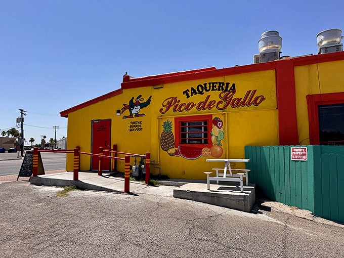 The sunshine-yellow exterior isn't just a building—it's a beacon of hope for hungry travelers across Arizona's desert landscape.