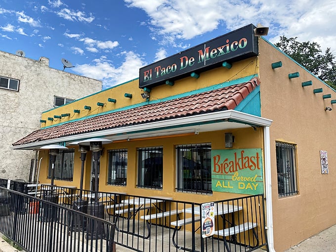 The little yellow building that launched a thousand road trips. El Taco de Mexico's vibrant exterior promises authentic delights within.