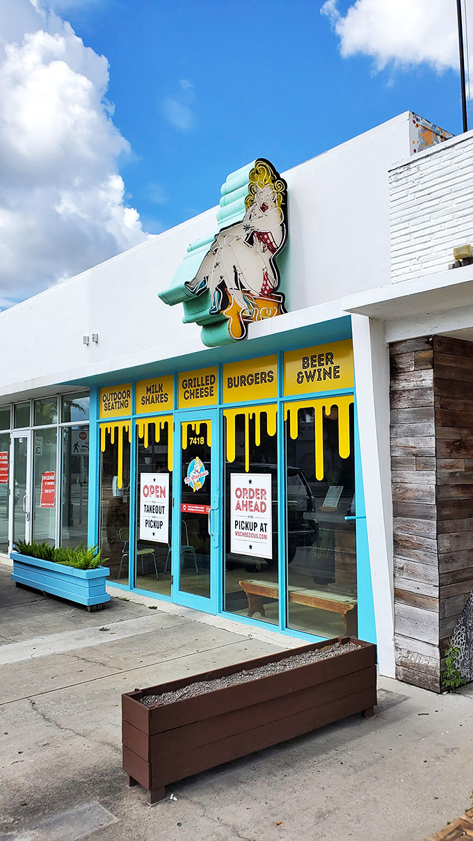 Ms. Cheezious announces itself with retro flair – that turquoise storefront and pin-up logo practically scream "comfort food lives here!"