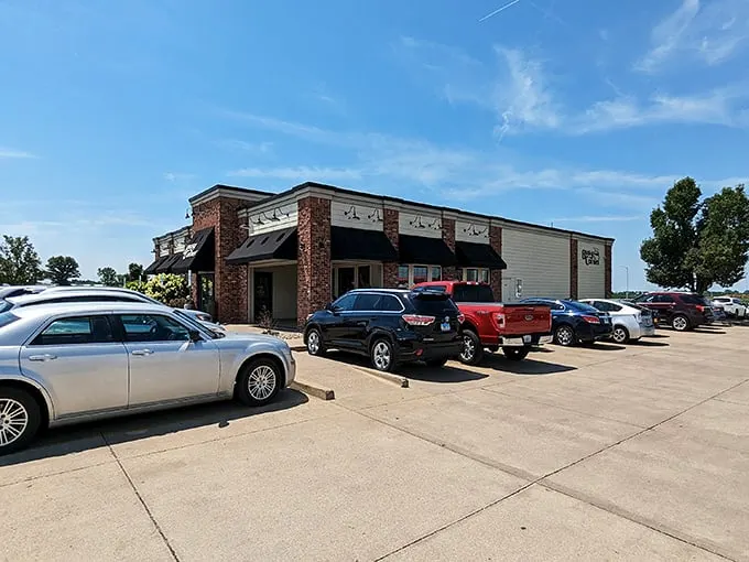 The unassuming brick exterior of Busy Corner belies the culinary treasures within. Like finding a Michelin star in your neighbor's garage.