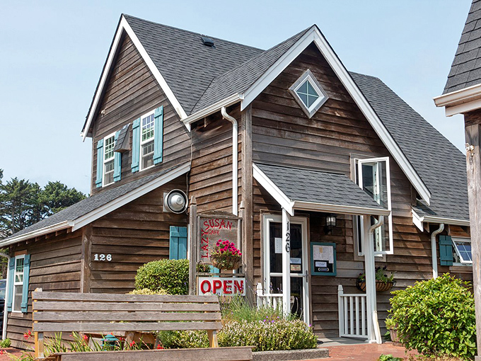 The storybook charm of this weathered cedar cottage promises breakfast magic before you even step inside.