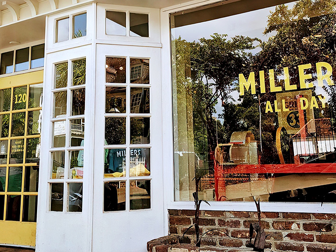 A glimpse of paradise through paned windows—Millers All Day's inviting exterior promises breakfast bliss behind that cheerful yellow door.