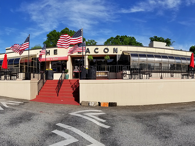 The Beacon's iconic façade stands proudly in Spartanburg, its red awnings and stone steps beckoning hungry travelers like a culinary lighthouse on the South Carolina shore.
