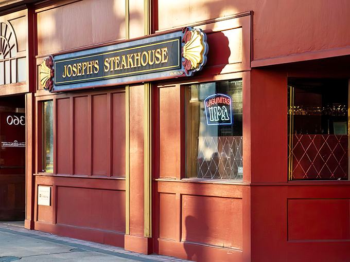 The unassuming brick façade of Joseph's Steakhouse hides culinary greatness like Clark Kent's glasses hide Superman. Classic signage promises old-school excellence.