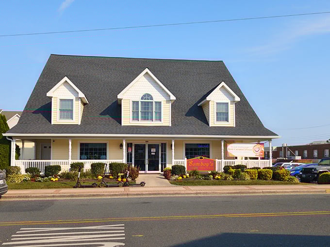 The Cape Cod charm of Bomboy's exterior isn't just inviting—it's a siren call to sweet-toothed pilgrims. That "Fudge Sale" sign might as well say "Resistance Is Futile."