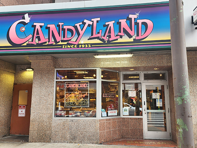 The iconic Candyland storefront beckons with its rainbow-hued sign – a portal to childhood that's been tempting Minneapolis sweet tooths since 1932.