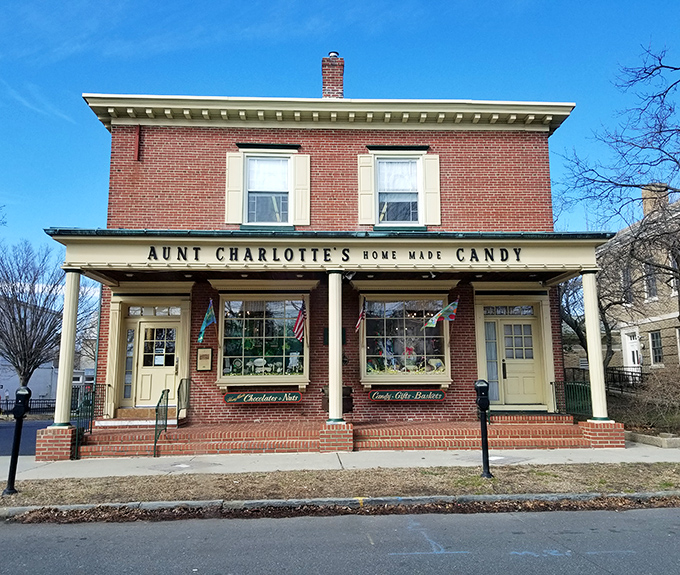 The brick facade of Aunt Charlotte's stands like a sweet sentinel of simpler times, promising confectionery magic behind those welcoming doors.