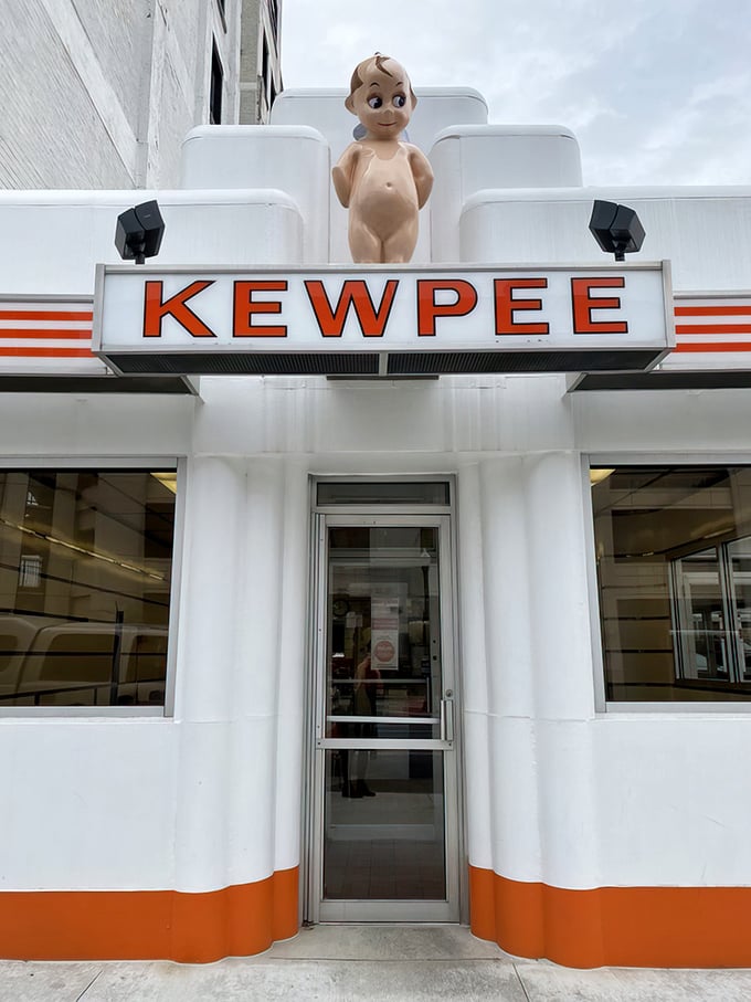 The iconic white Art Deco building with its signature Kewpee doll stands like a time capsule on Lima's streetscape, beckoning burger pilgrims from miles around.