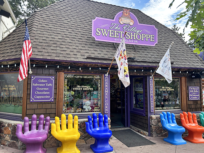 Those colorful hand-shaped chairs aren't just for sitting—they're your first clue that adulthood's rules about "not playing with your food" don't apply here.