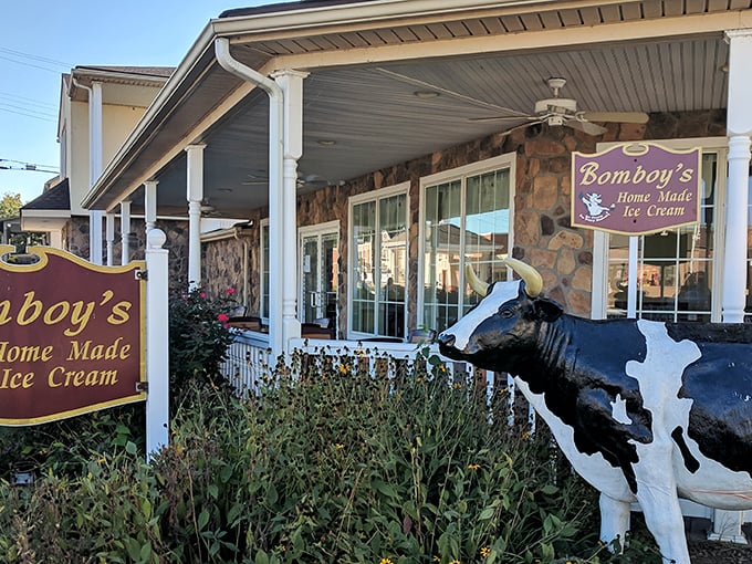 The Cape Cod charm of Bomboy's exterior isn't just inviting—it's a siren call to sweet-toothed pilgrims. That "Fudge Sale" sign might as well say "Resistance Is Futile."
