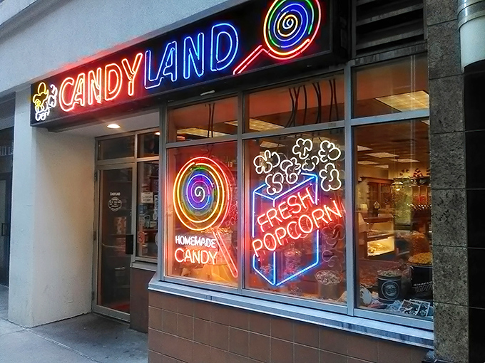 The iconic Candyland storefront beckons with its rainbow-hued sign – a portal to childhood that's been tempting Minneapolis sweet tooths since 1932.