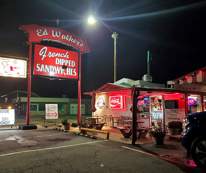 The neon glow of Ed Walker's iconic sign beckons hungry travelers like a lighthouse for empty stomachs. Americana doesn't get more authentic than this.