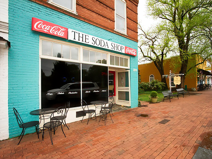 The turquoise facade of The Soda Shop stands out like a nostalgic beacon on Davidson's Main Street, promising comfort and conversation in equal measure.