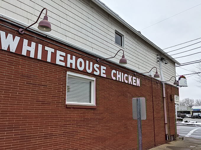 The iconic chicken sign perched atop White House Chicken isn't just decoration—it's a beacon calling hungry pilgrims to Barberton's fried chicken mecca.