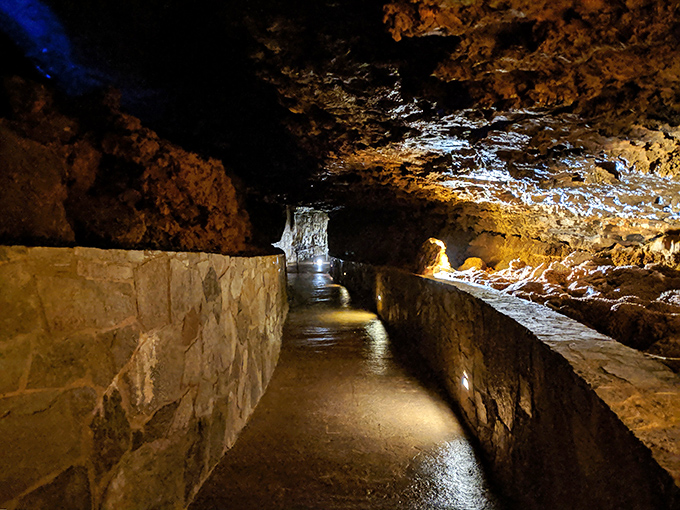Nature's own light show illuminates this underground cathedral, where stalactites and stalagmites have been playing the world's slowest game of tag for millennia.